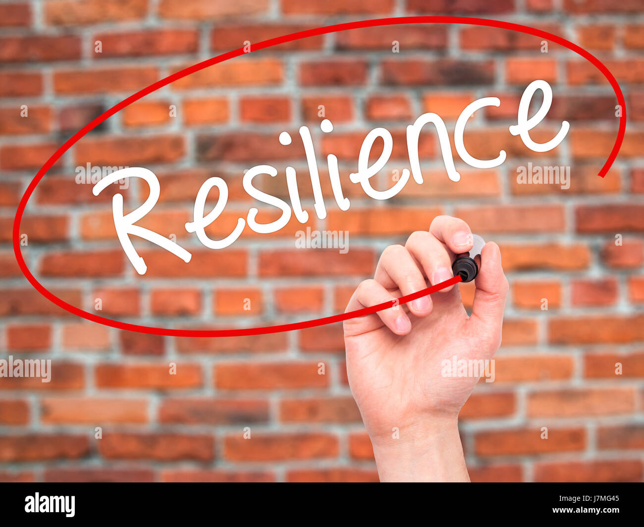 Man Hand writing Resilience with black marker on visual screen ...