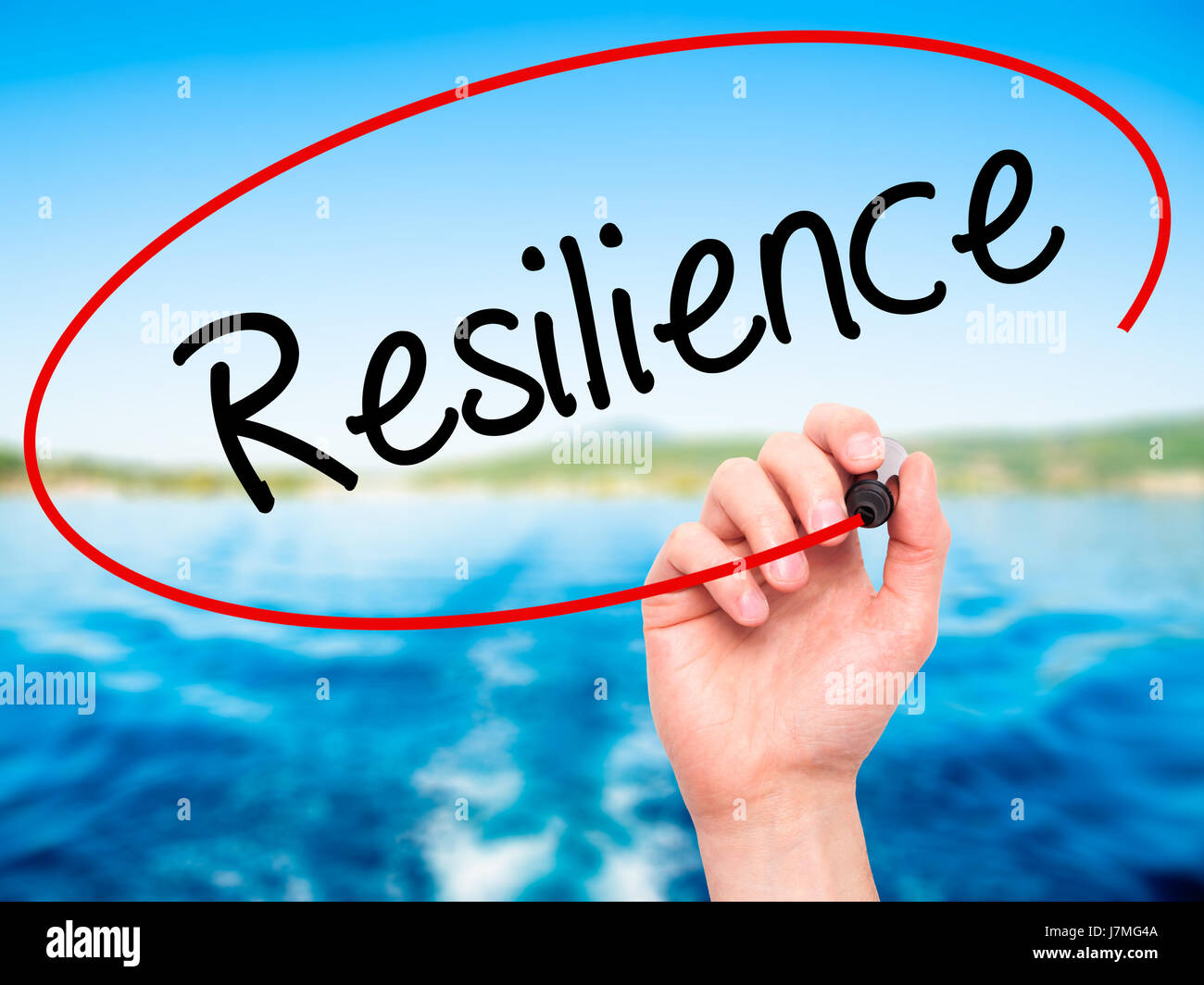 Man Hand writing Resilience with black marker on visual screen ...