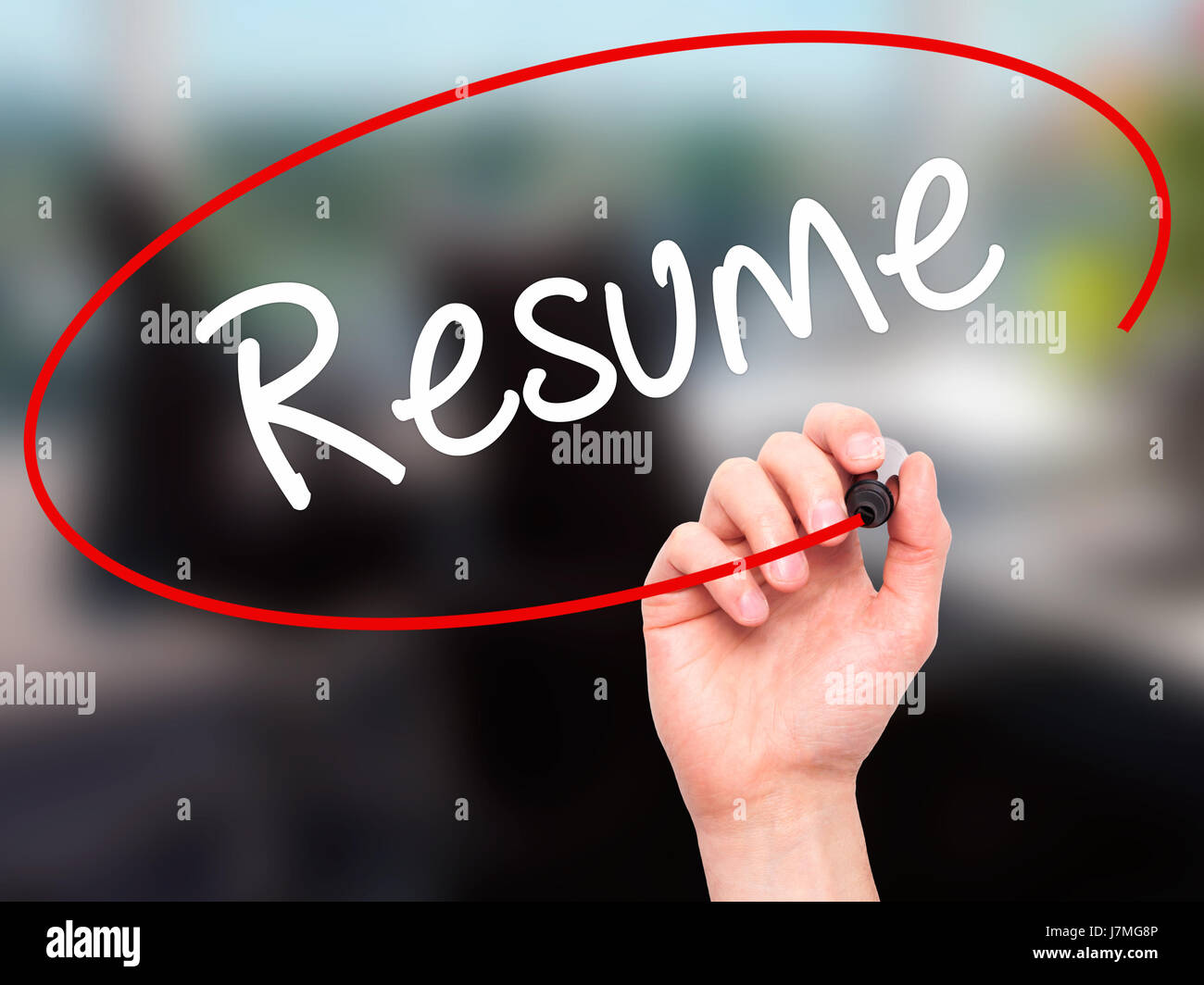 Man Hand writing Resume with black marker on visual screen. Isolated on ...