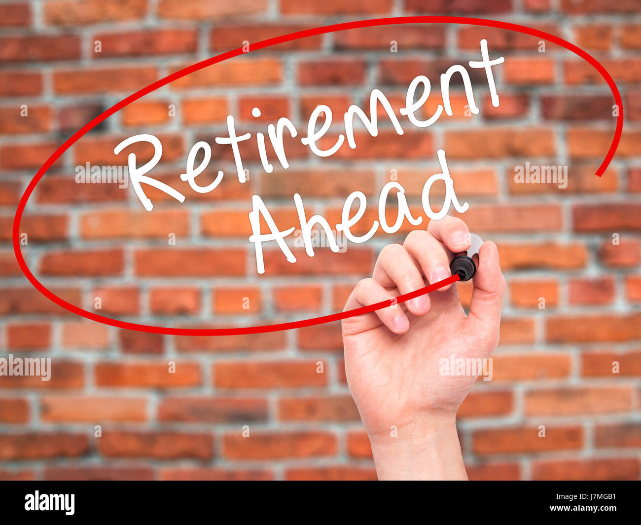 Man Hand writing Retirement Ahead with black marker on visual screen ...