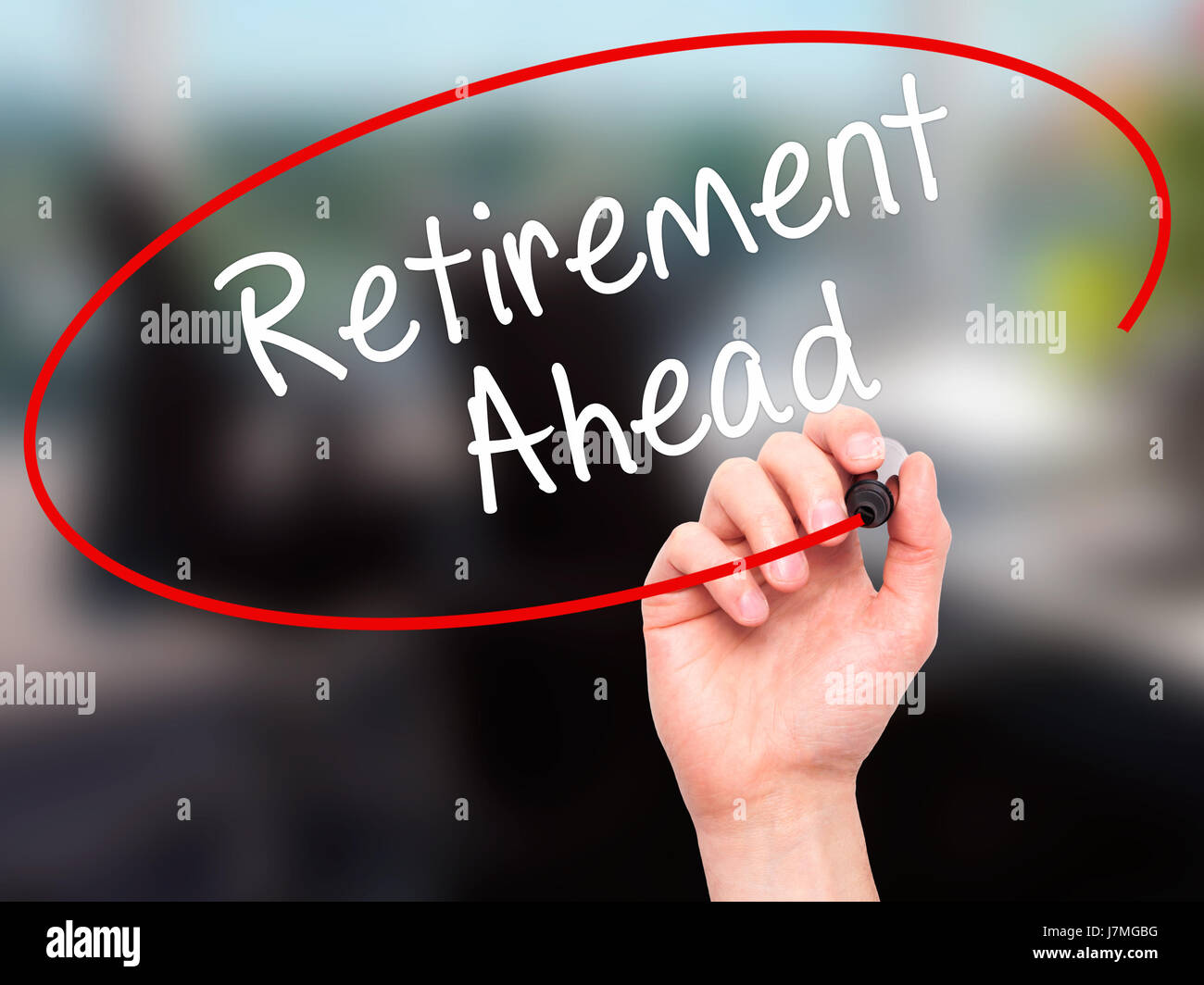 Man Hand writing Retirement Ahead with black marker on visual screen ...