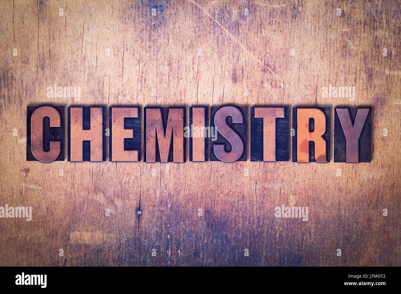 The word Chemistry concept and theme written in vintage wooden ...