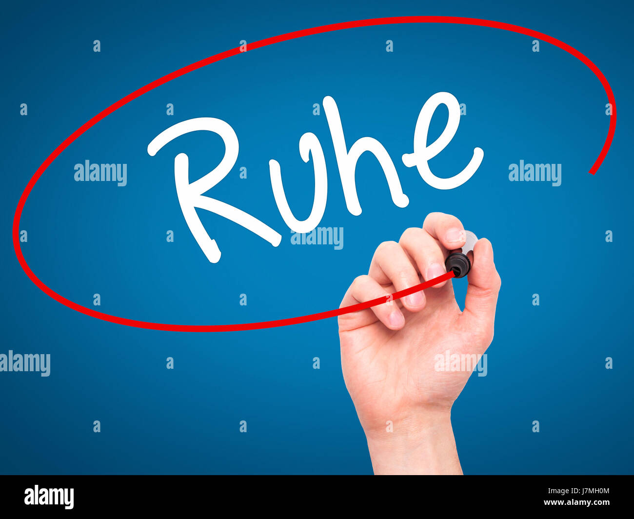 Man Hand writing Ruhe (Quiet in German) with black marker on visual ...