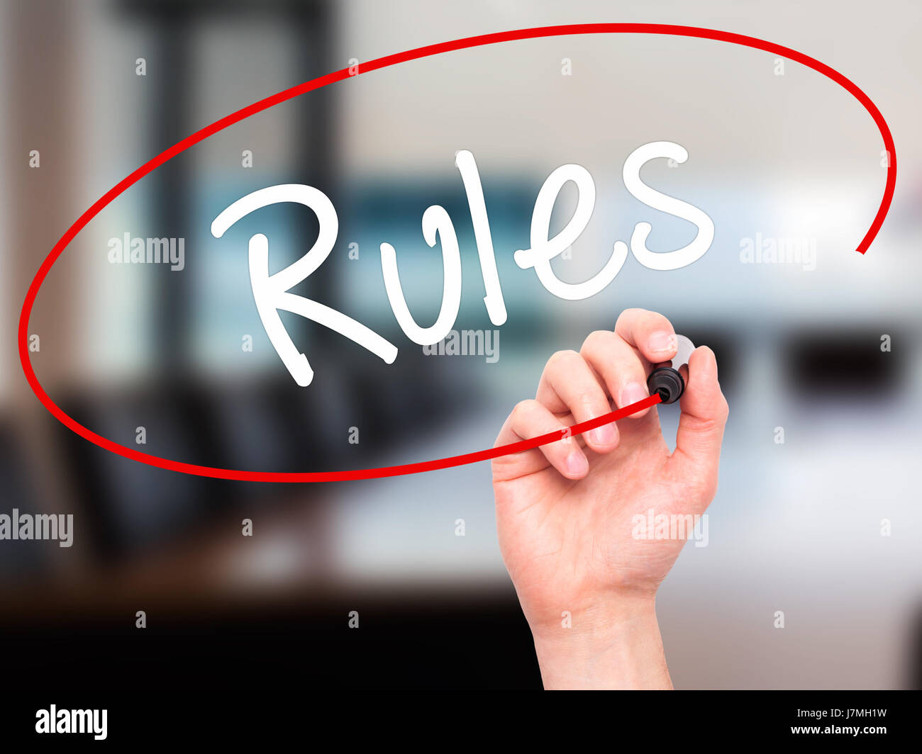 Man Hand writing Rules with black marker on visual screen. Isolated on ...