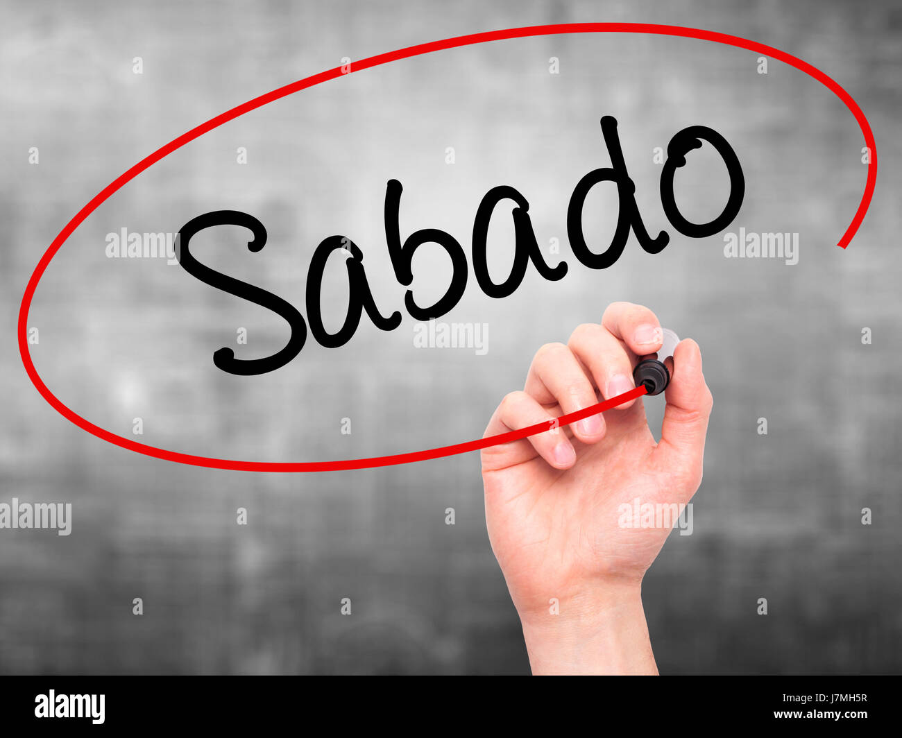 Man Hand writing Sabado (Saturday in Spanish/Portuguese) with black ...