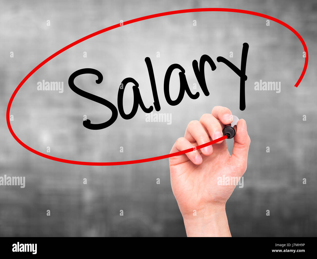 Man Hand writing Salary with black marker on visual screen. Isolated on ...
