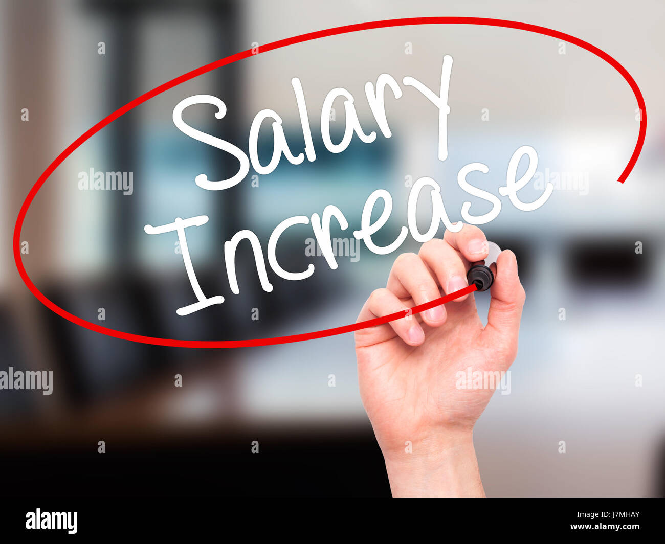 Man Hand writing Salary Increase with black marker on visual screen ...