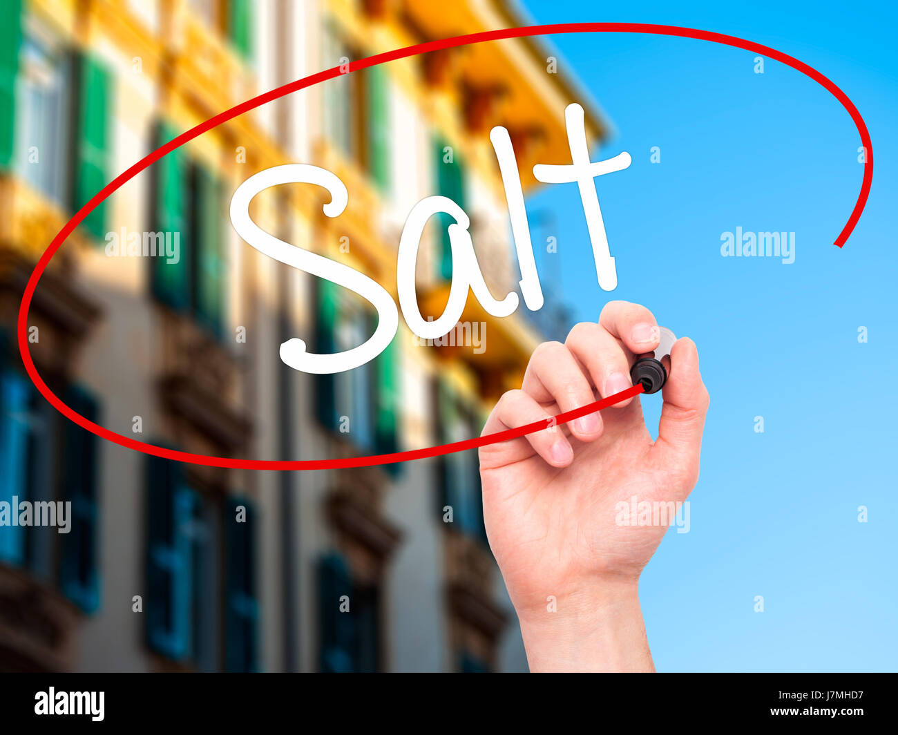 Man Hand writing Salt with black marker on visual screen. Isolated on ...