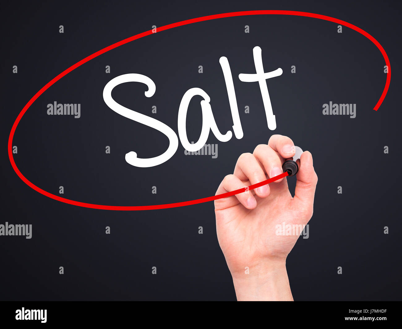 Man Hand writing Salt with black marker on visual screen. Isolated on ...