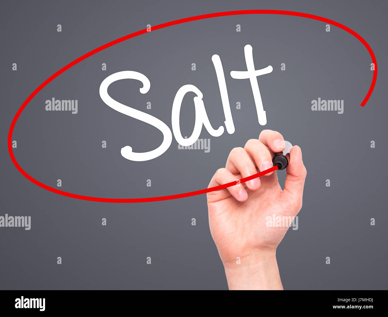 Man Hand writing Salt with black marker on visual screen. Isolated on ...