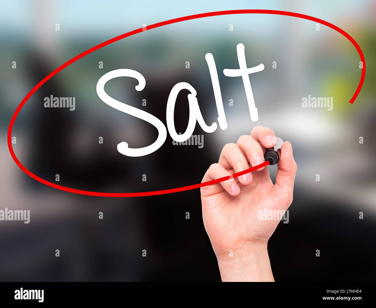 Man Hand writing Salt with black marker on visual screen. Isolated on ...