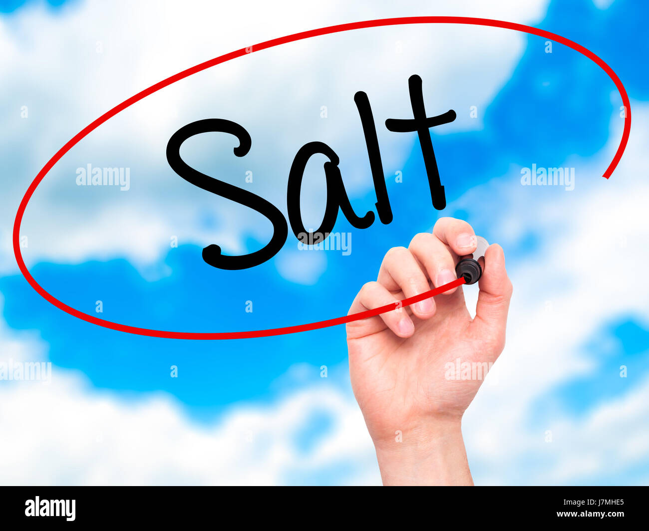 Man Hand writing Salt with black marker on visual screen. Isolated on ...