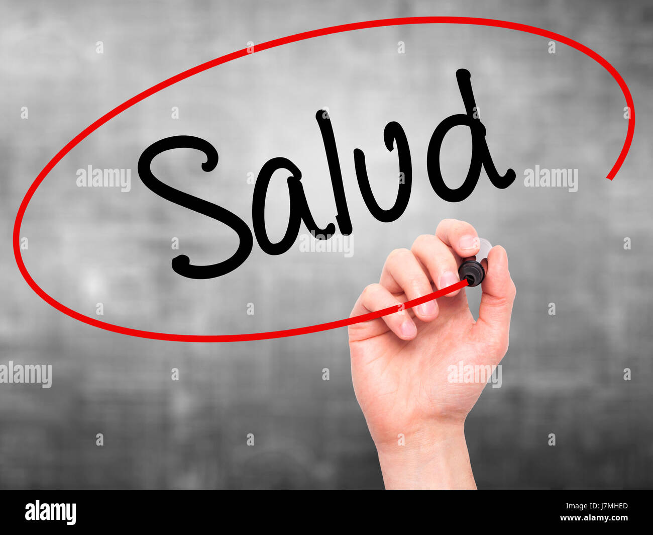 Man Hand writing Salud (Health in Spanish) with black marker on visual ...