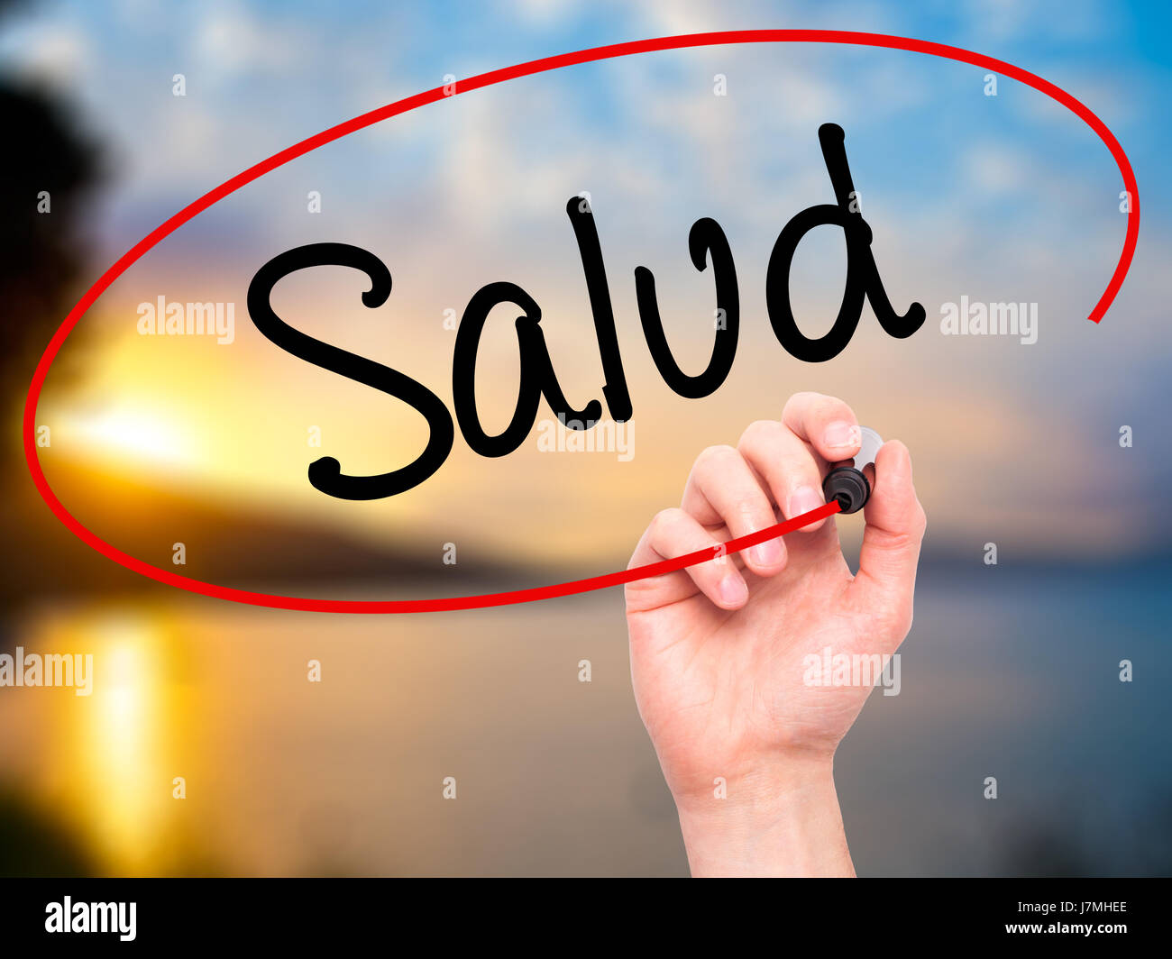 Man Hand writing Salud (Health in Spanish) with black marker on visual ...