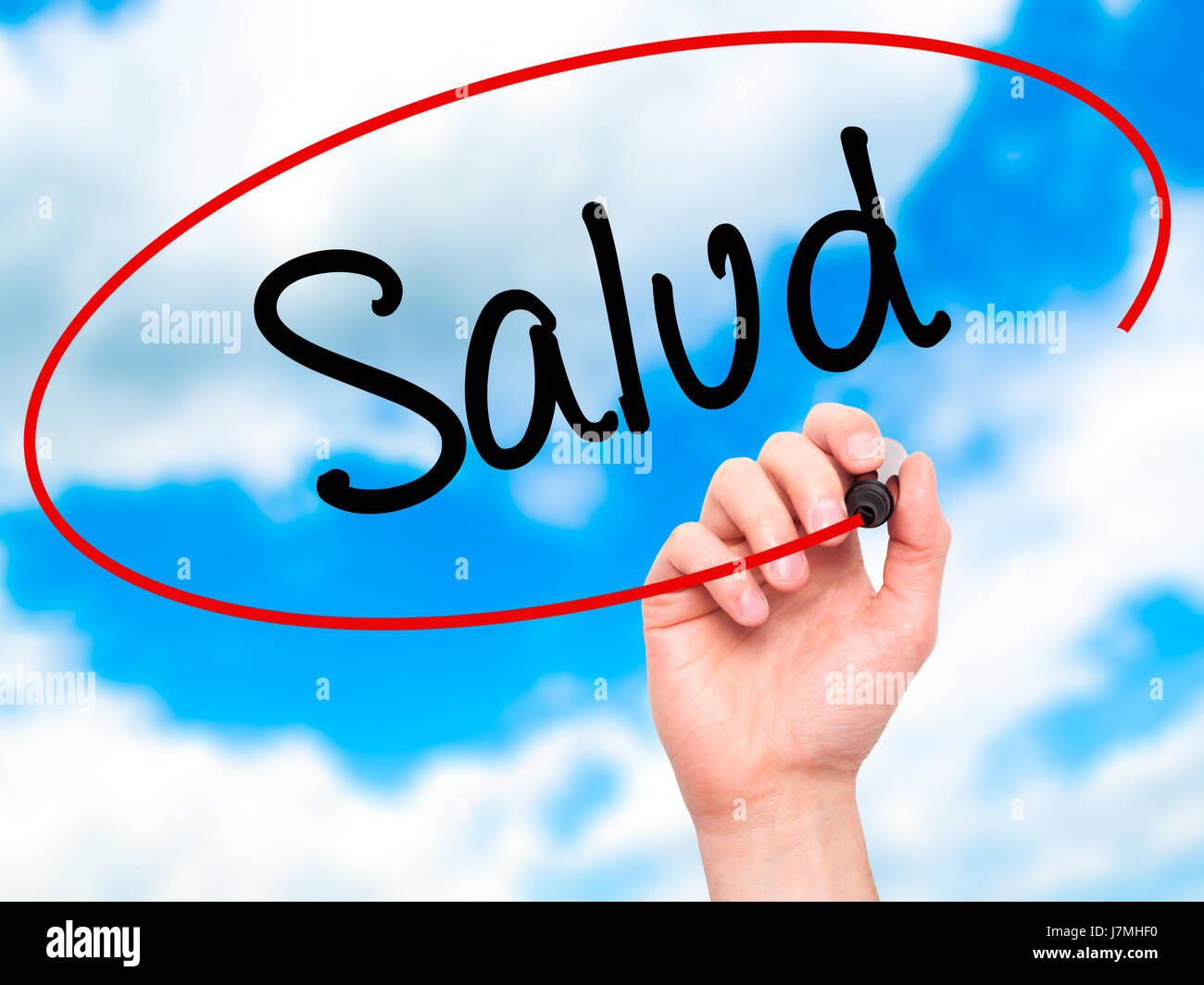 Man Hand writing Salud (Health in Spanish) with black marker on visual ...