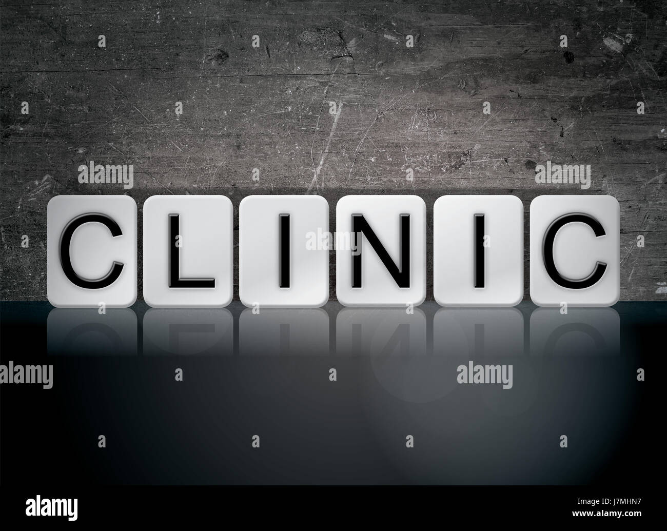 The word Clinic concept and theme written in white tiles on a dark ...
