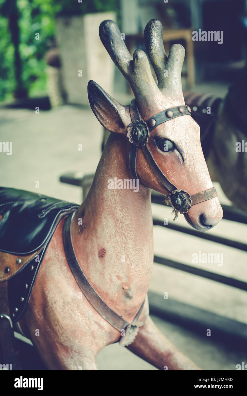 vintage wood rocking deer Stock Photo - Alamy