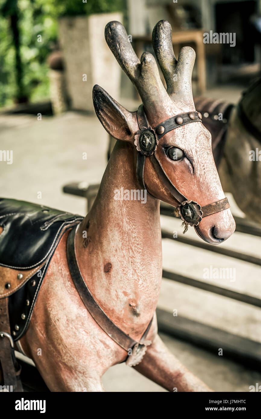 vintage wood rocking deer Stock Photo - Alamy