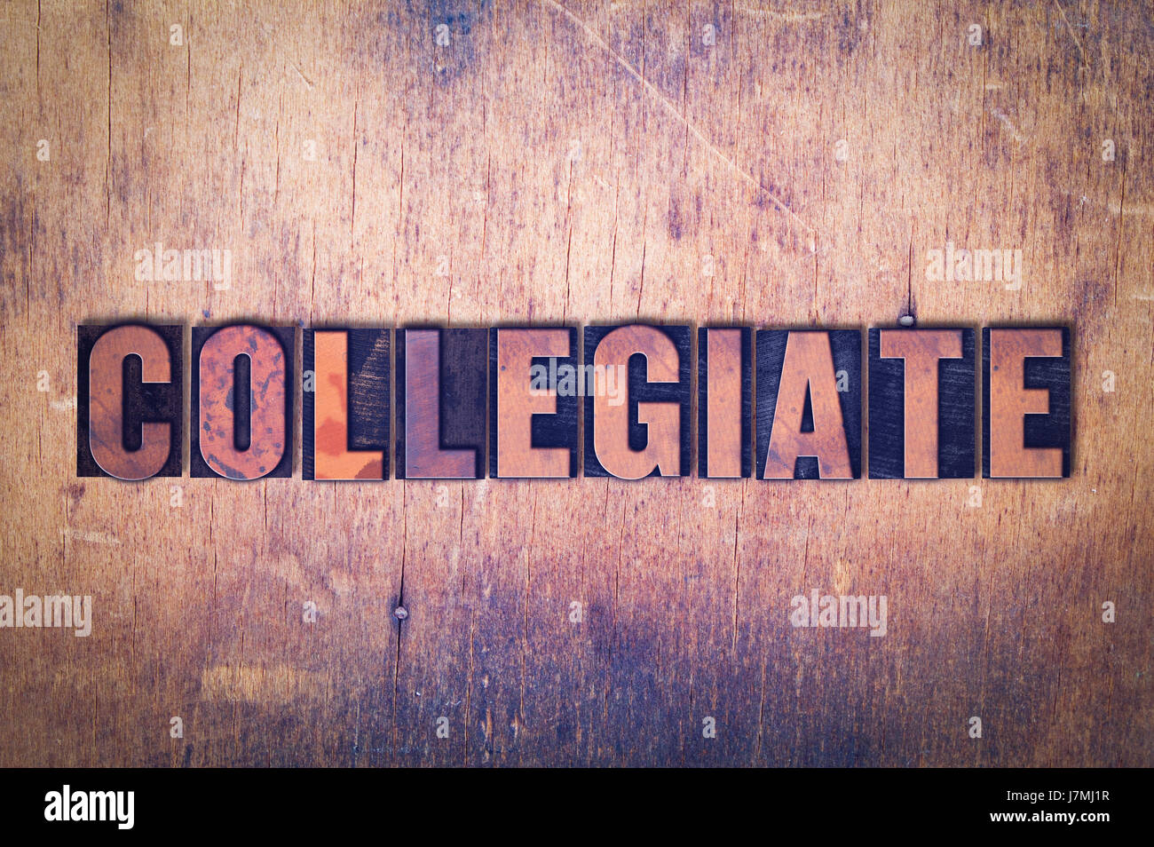 The word Collegiate concept and theme written in vintage wooden ...