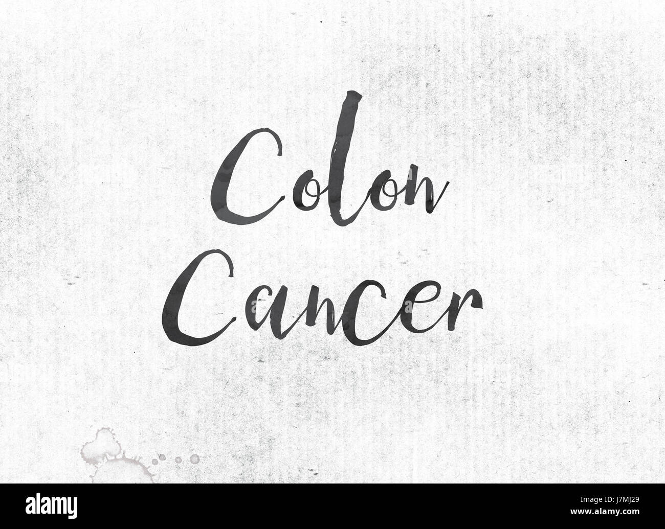 The words Colon Cancer concept and theme painted in black ink on a ...