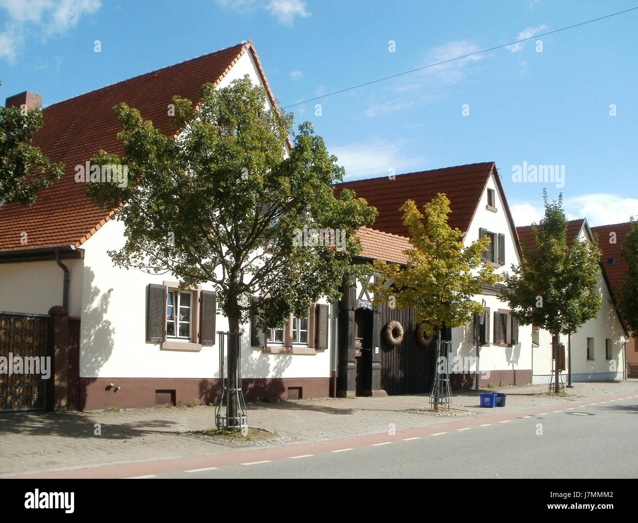 The image captures a residential building located at Hauptstrasse 12 in ...