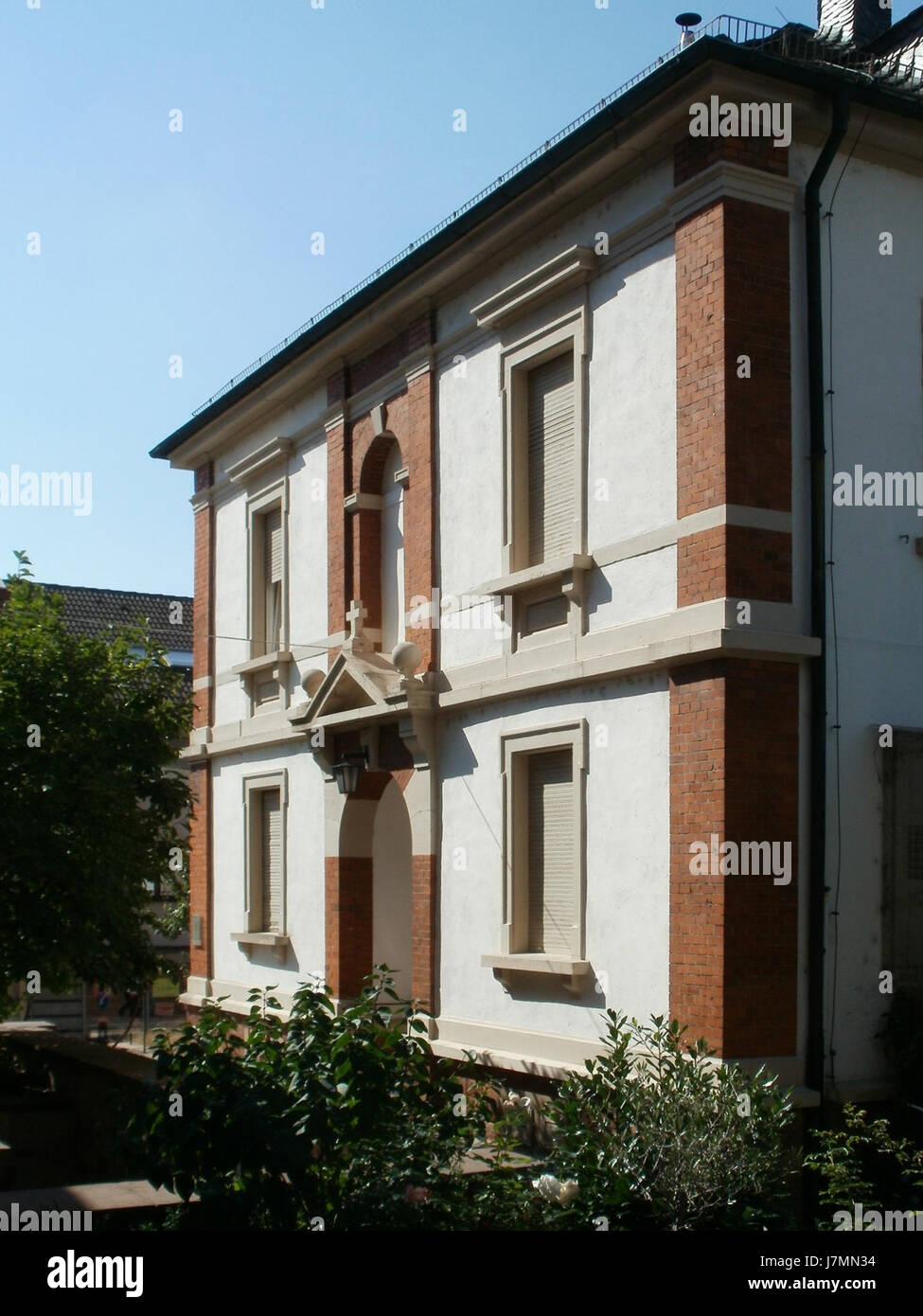 The image shows the Pfarrhaus (parsonage) in Hockenheim, Germany, a ...