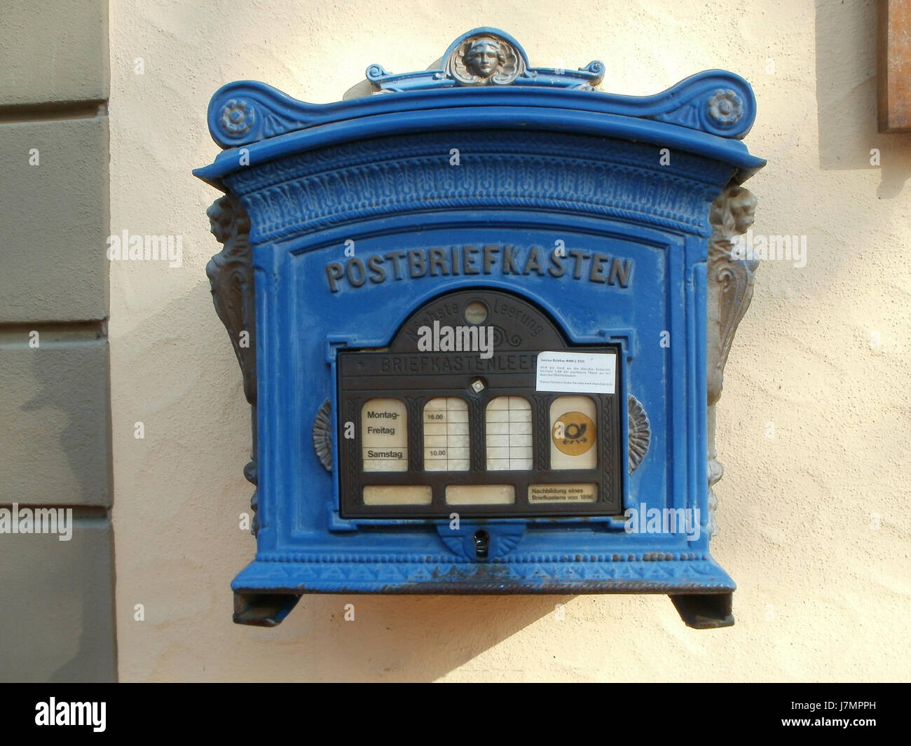 This photograph shows a historical mailbox (Briefkasten) located in ...