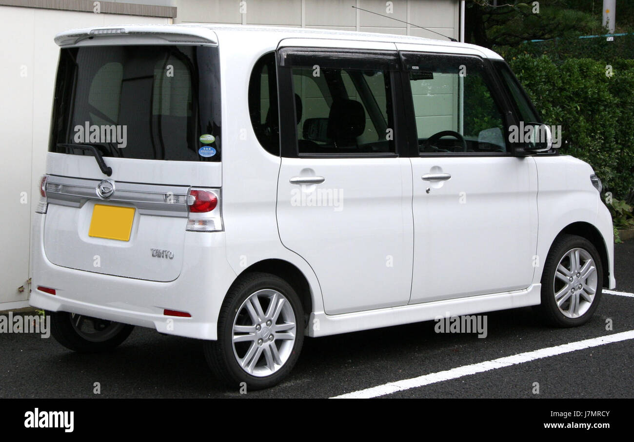 The 2010 Daihatsu Tanto Custom is a compact car with a modern rear ...