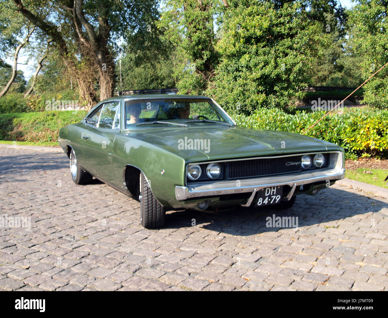 This is a photograph of a 1968 Dodge Charger, a classic American muscle ...