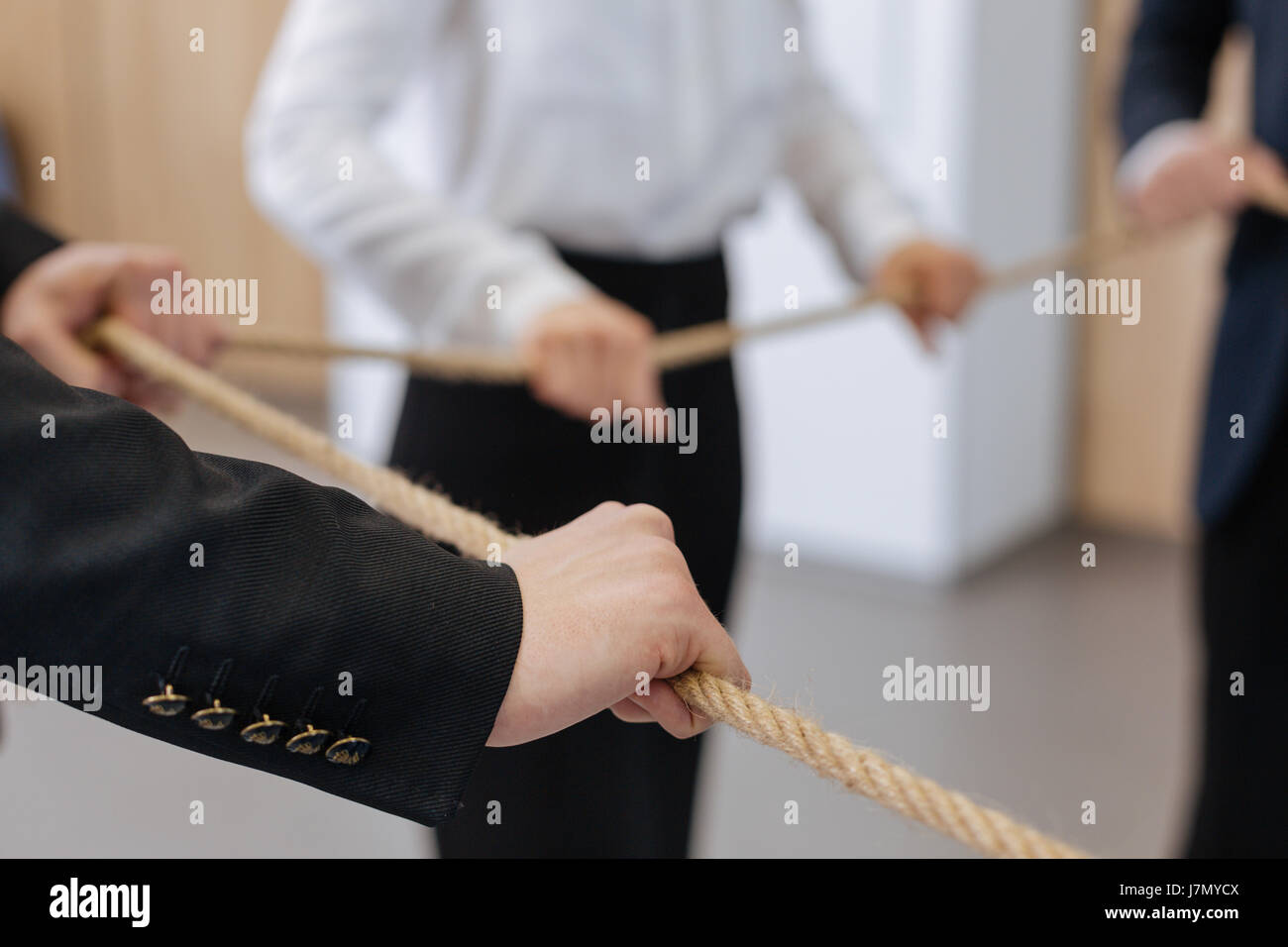 Close up of male hand holding the rope Stock Photo - Alamy