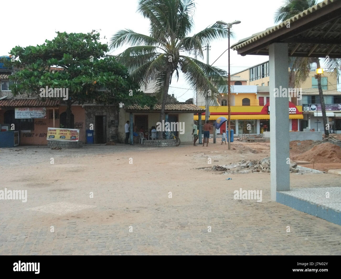This photograph captures the Main Square in Arembepe, Bahia, Brazil ...