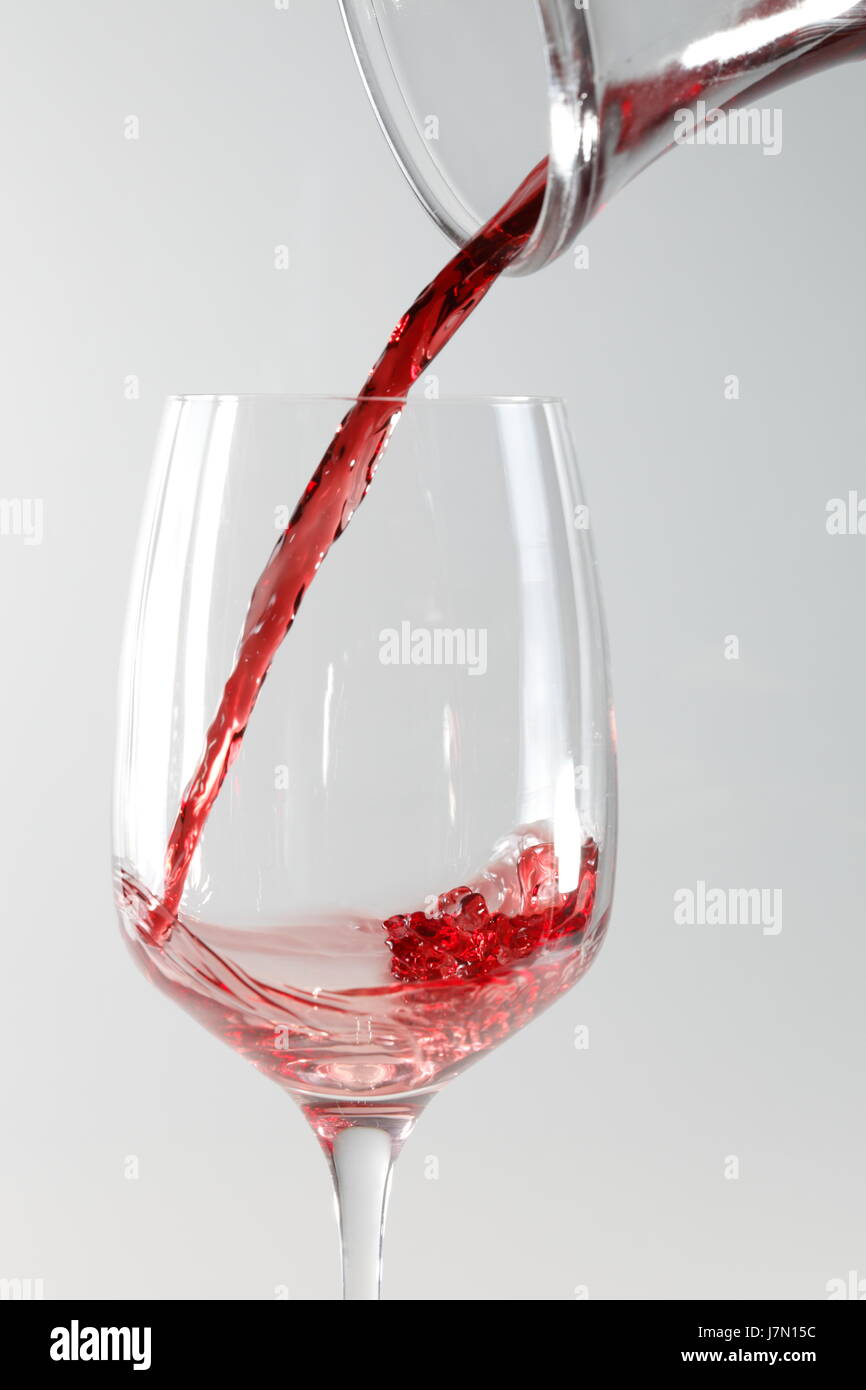 pouring red wine Stock Photo - Alamy