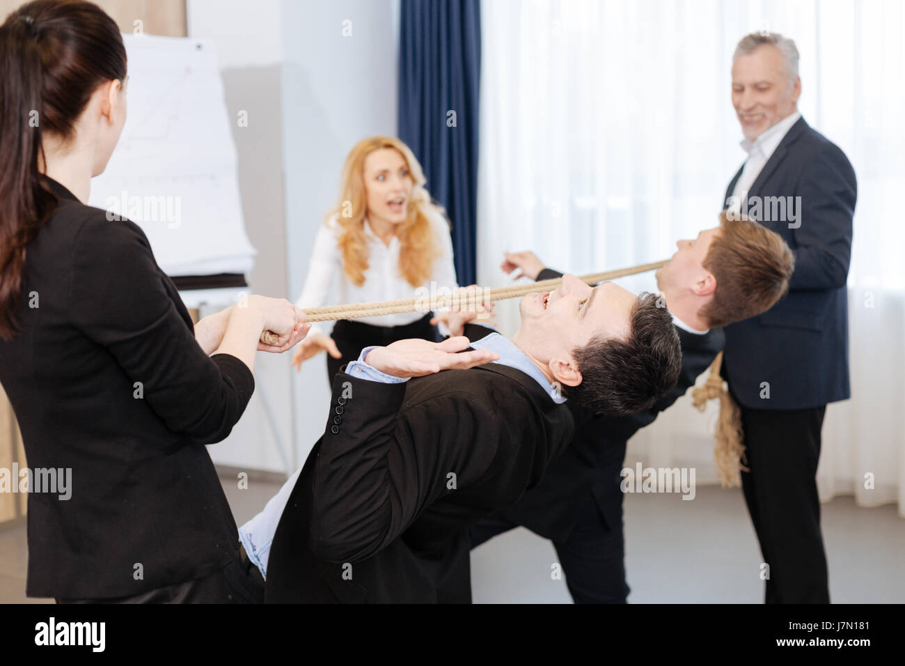 Teambuilding activity man team hi-res stock photography and images - Alamy