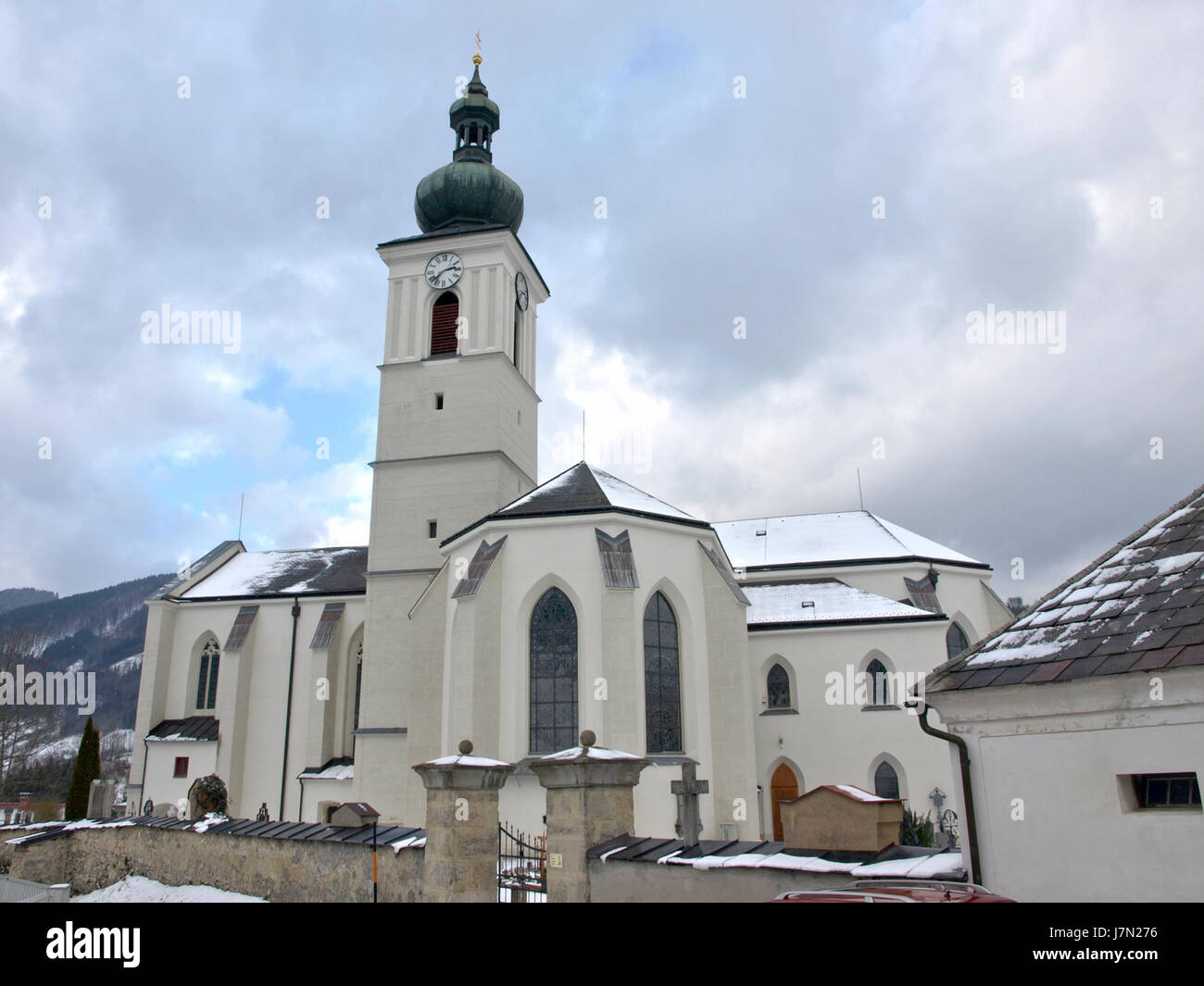 The image depicts the *Pfarrkirche hl. Johannes*, a church located in ...