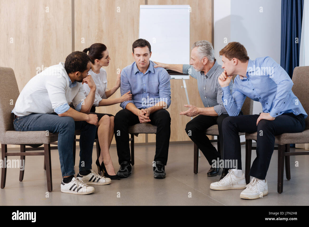 Good looking positive people showing their sympathy Stock Photo - Alamy