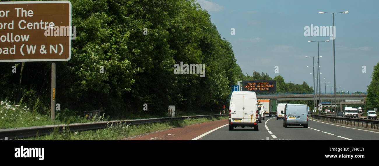 Manchester, UK. 25th May, 2017. Overhead matrix sign on M56 into ...