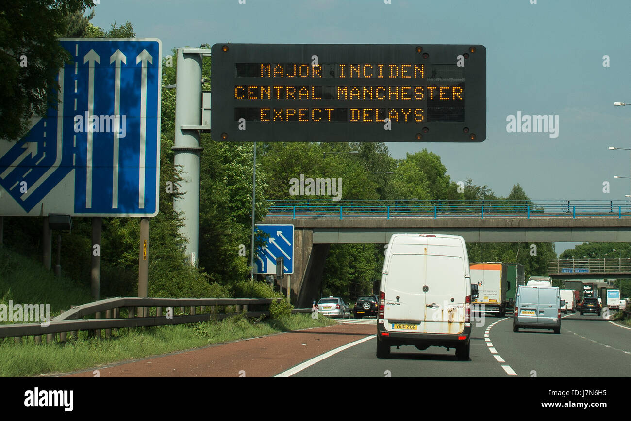 Manchester, UK. 25th May, 2017. Overhead matrix sign on M56 into ...