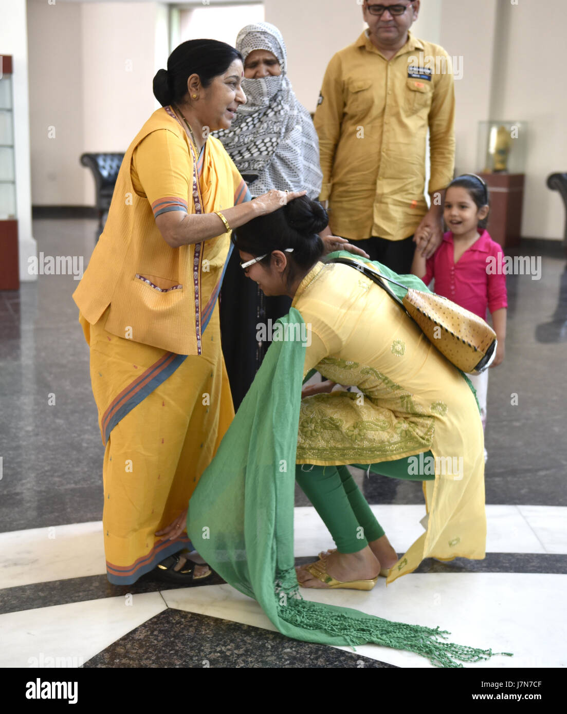 NEW DELHI, INDIA - MAY 25: Uzma Ahmed touches feet of Union External ...