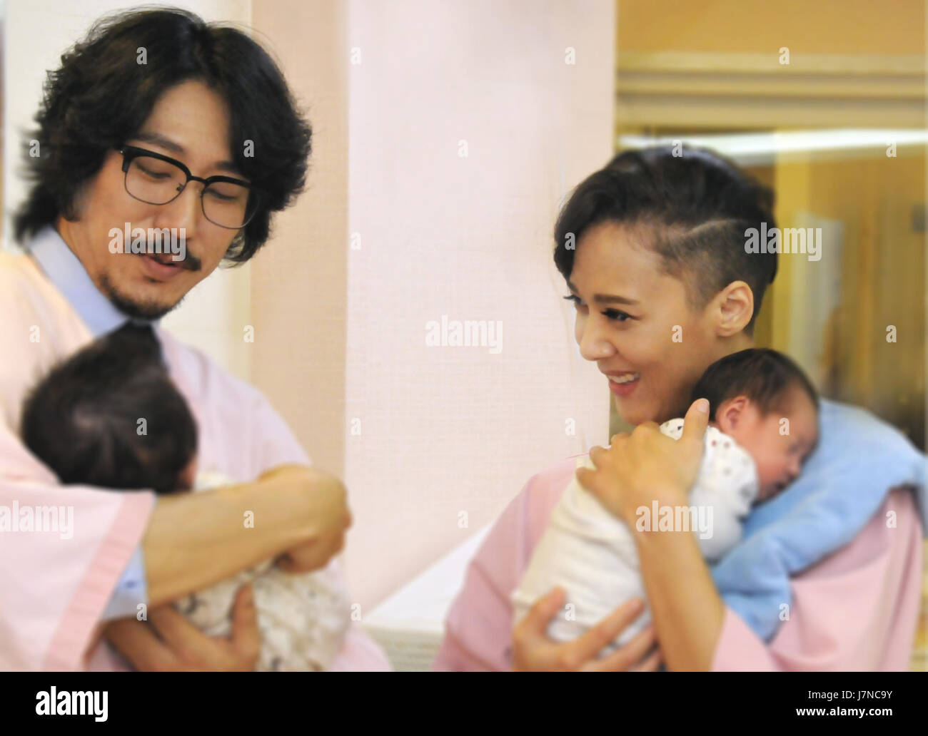 Tiger JK with adoptees Rapper Tiger JK (L) attends an event in Seoul on ...