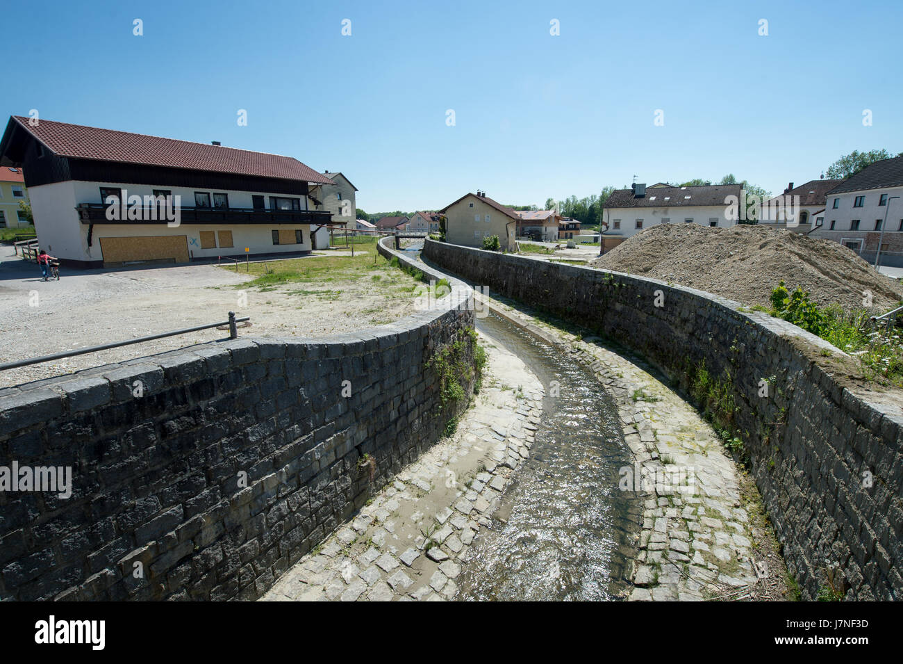 The Simbach river is pictured running through Simbach am Inn, Germany ...