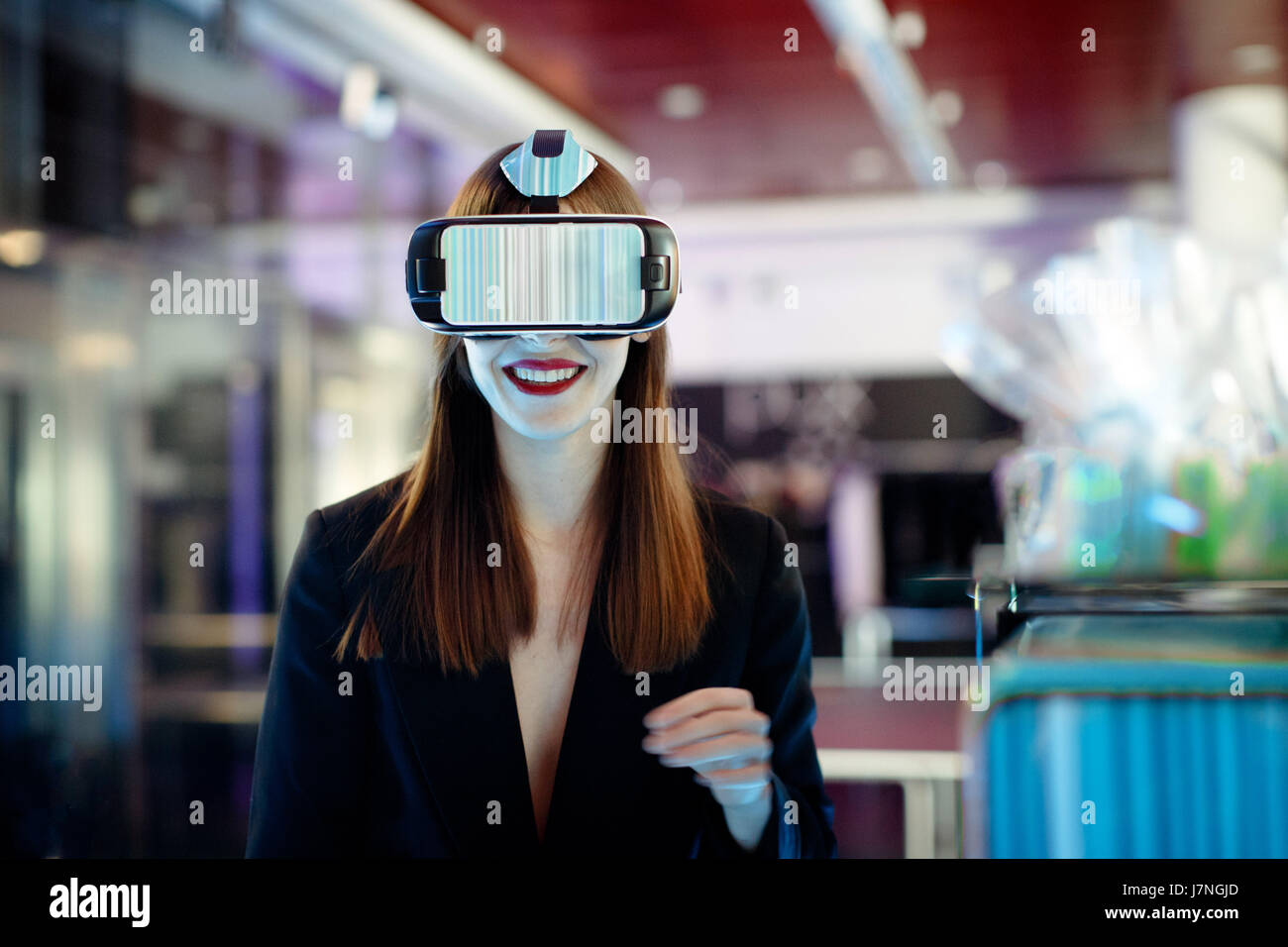 Female wearing virtual reality glasses Stock Photo - Alamy
