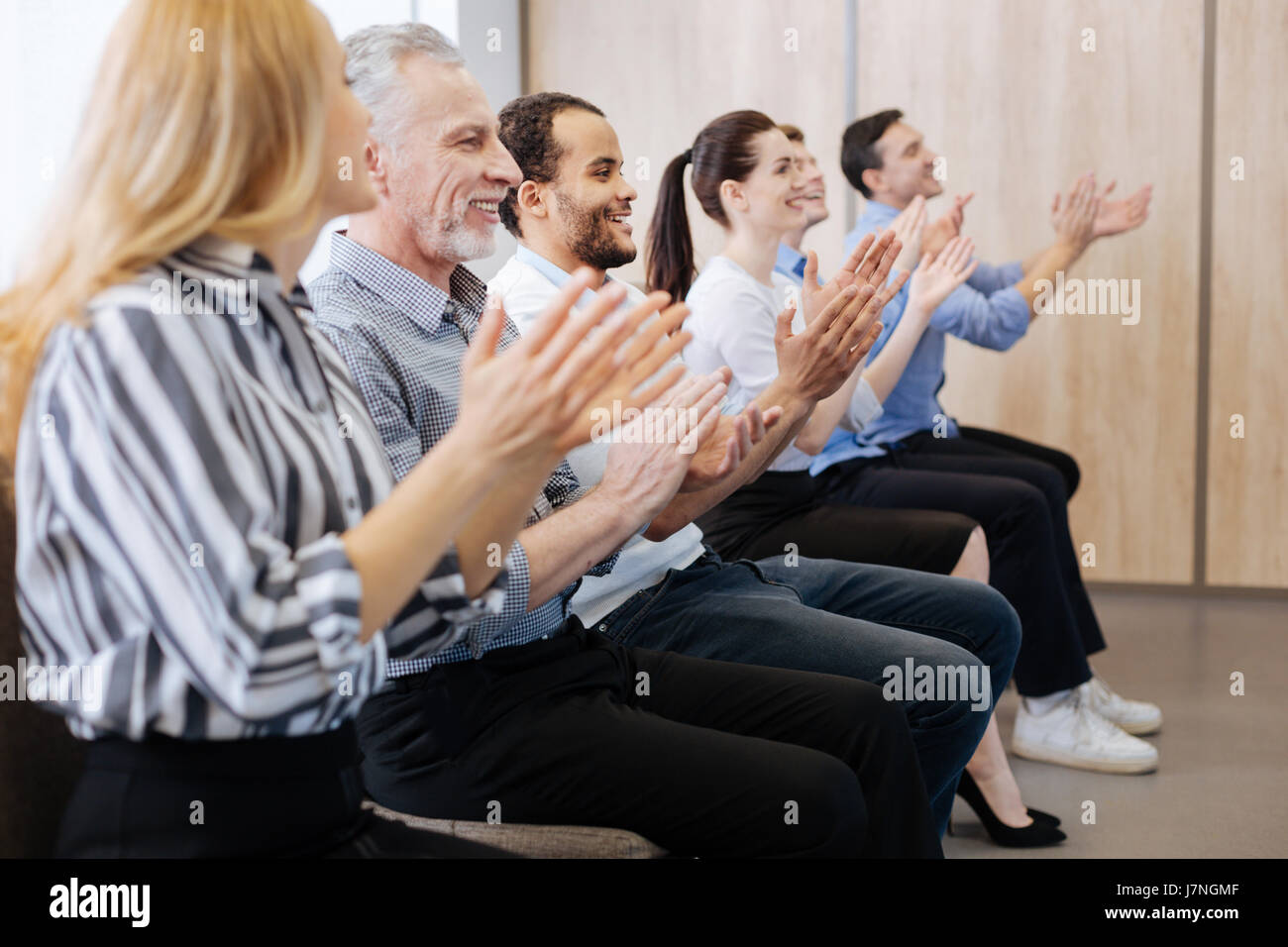 Happy joyful people applauding Stock Photo - Alamy