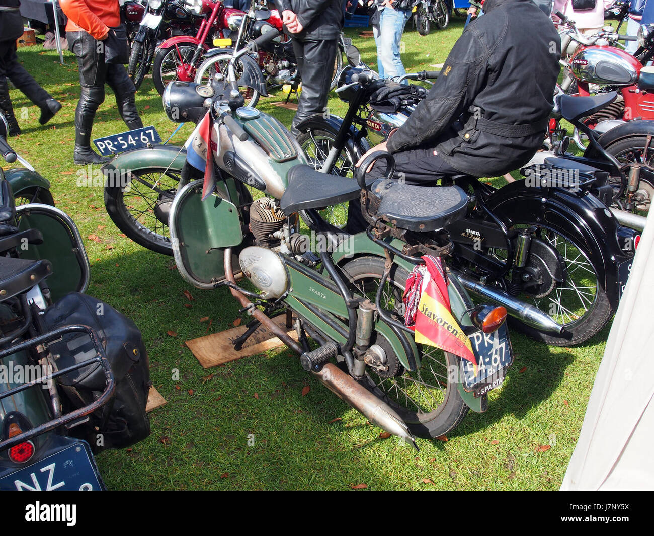 This image captures a 1954 Sparta 125 motorcycle, a classic model known ...