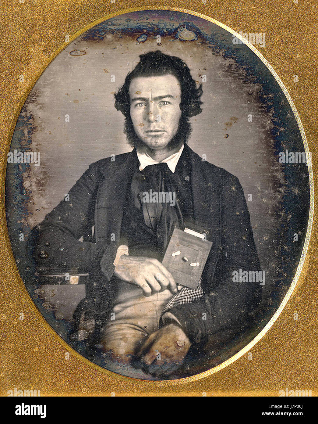 This daguerreotype photograph from the 1840s captures a gentleman in ...