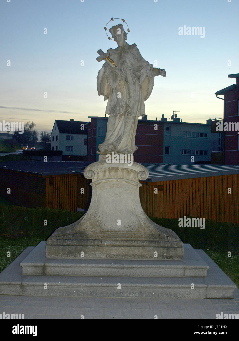 This photograph from Wallsee, Austria, shows a figurine of Saint John ...