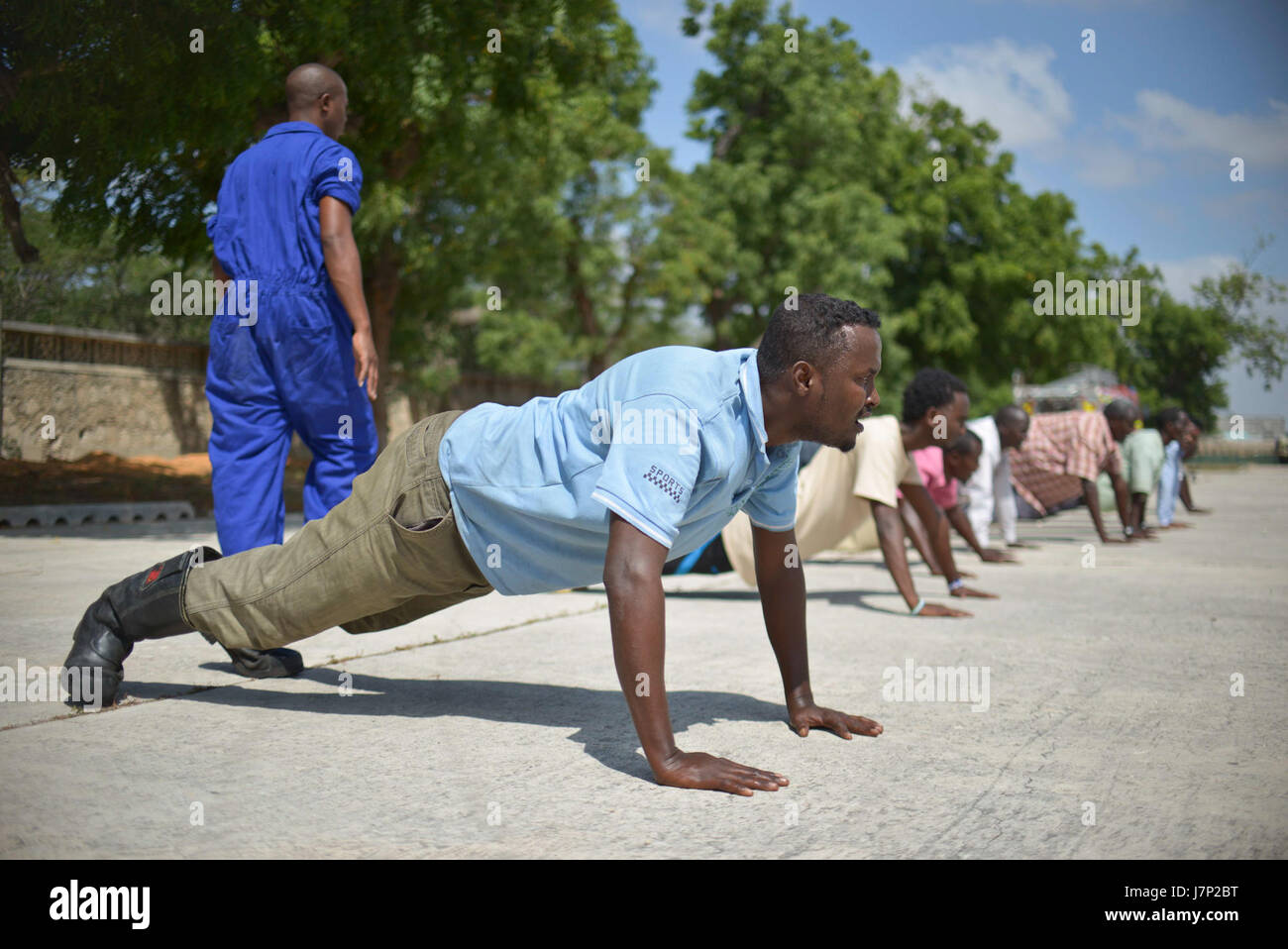 This image shows firefighters in action during a fire rescue operation ...
