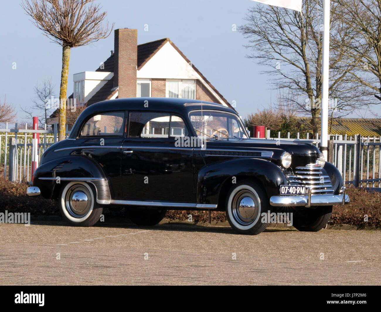 This photograph depicts the 1952 Opel Olympia, a German car model known ...