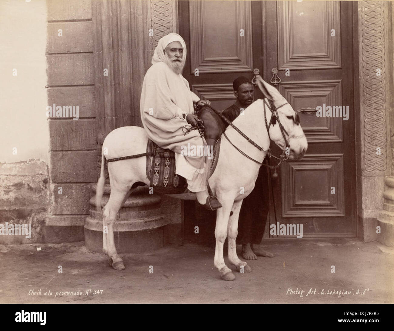 This photograph or artwork depicts an Arab Sheikh mounted on horseback ...