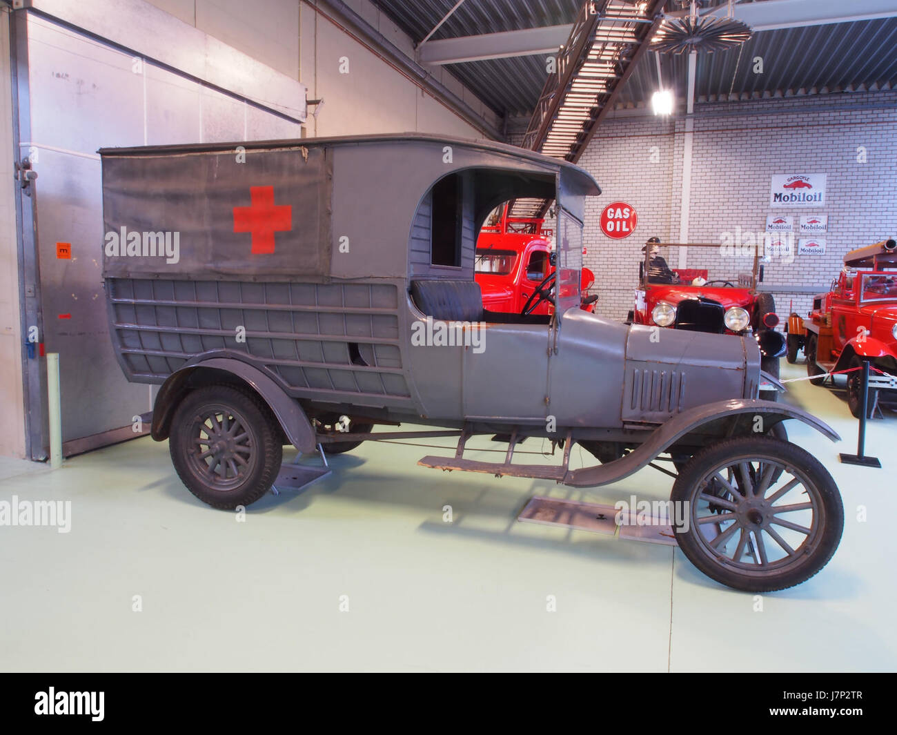 This photograph features a 1921 Ford Model T Ambulance, showcasing the ...