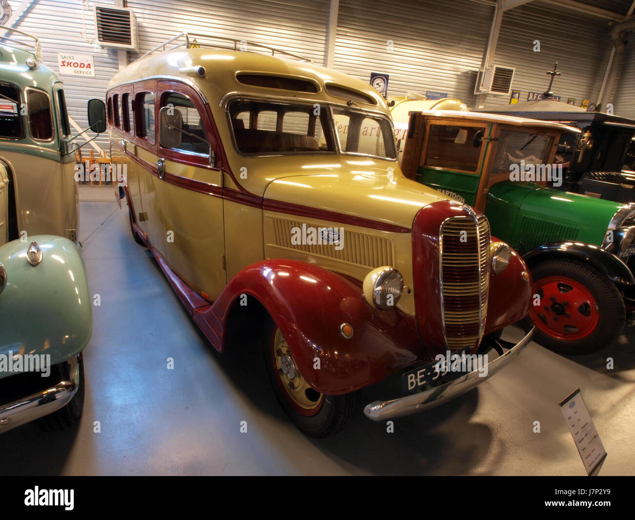 The image displays a 1937 Ford 950 bus, a classic vehicle from the pre ...